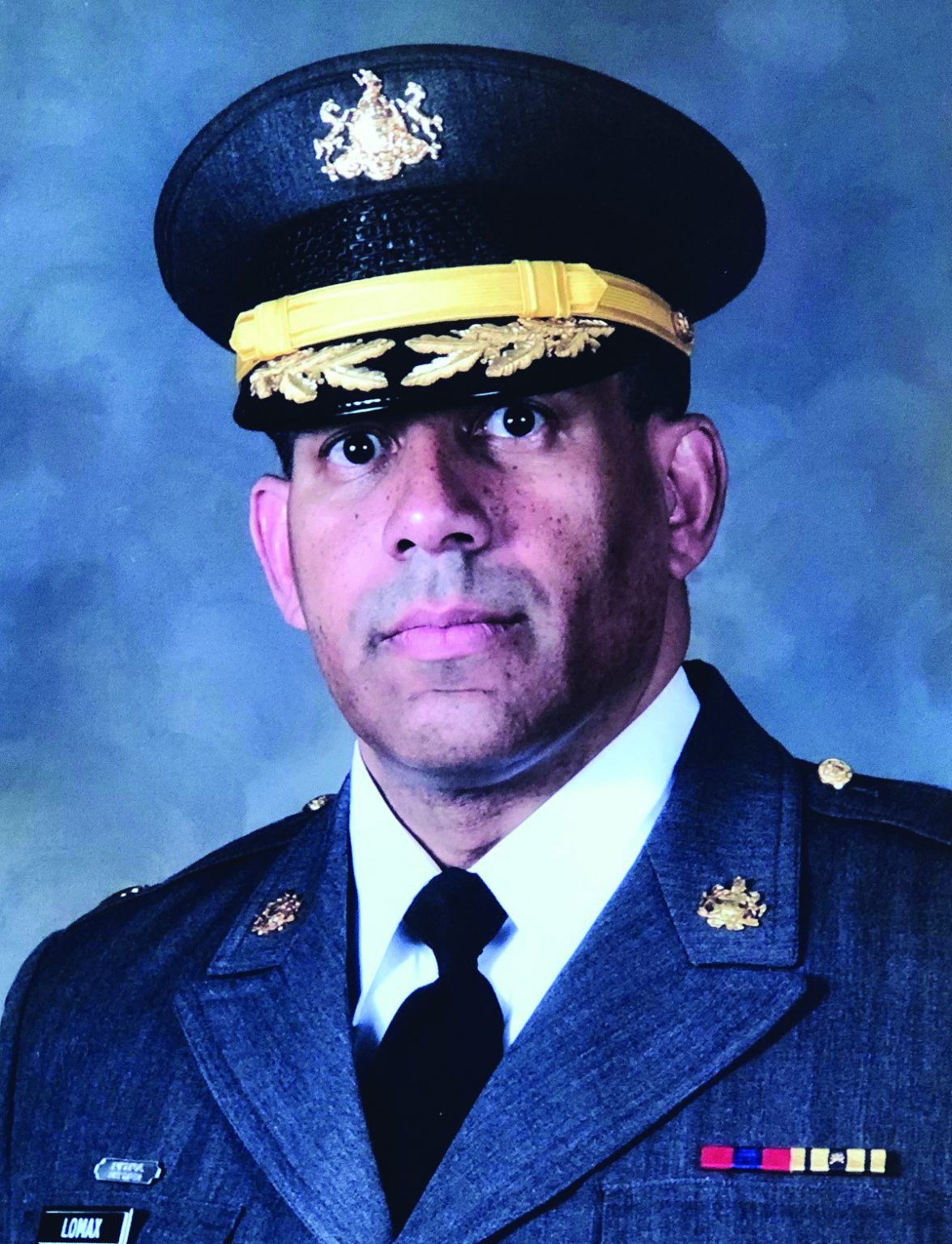 1.) Major (Ret.) Mark E. Lomax - Police Chief Magazine