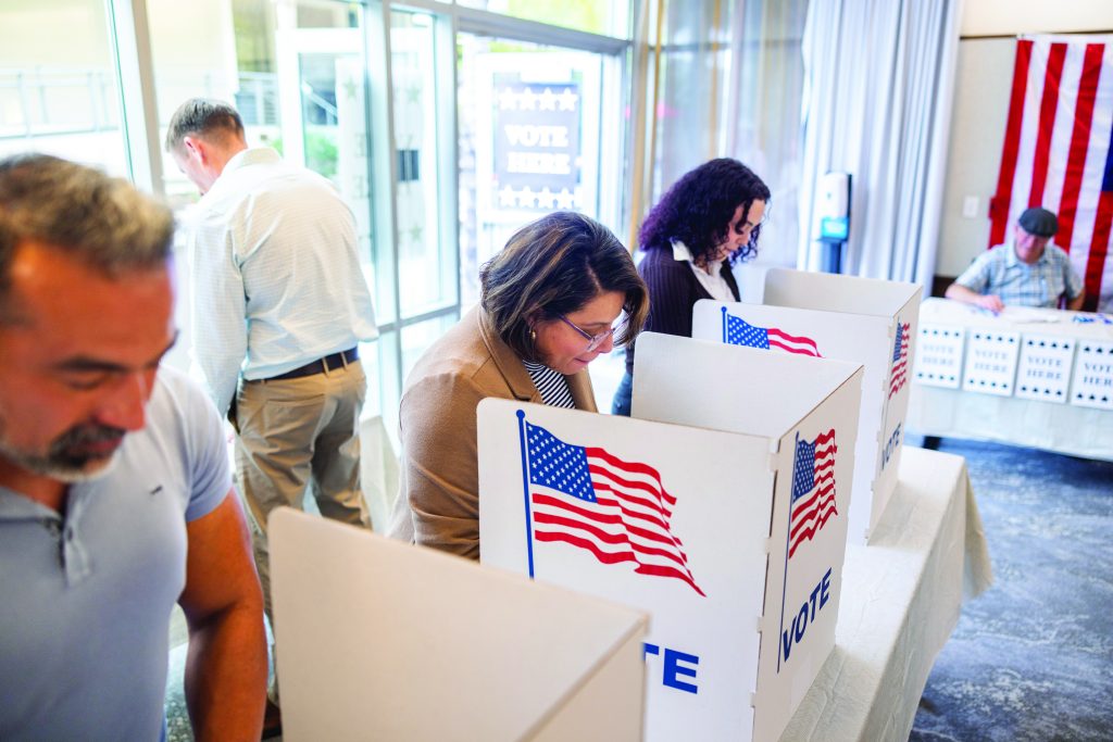 Americans voting in an election - Police Chief Magazine