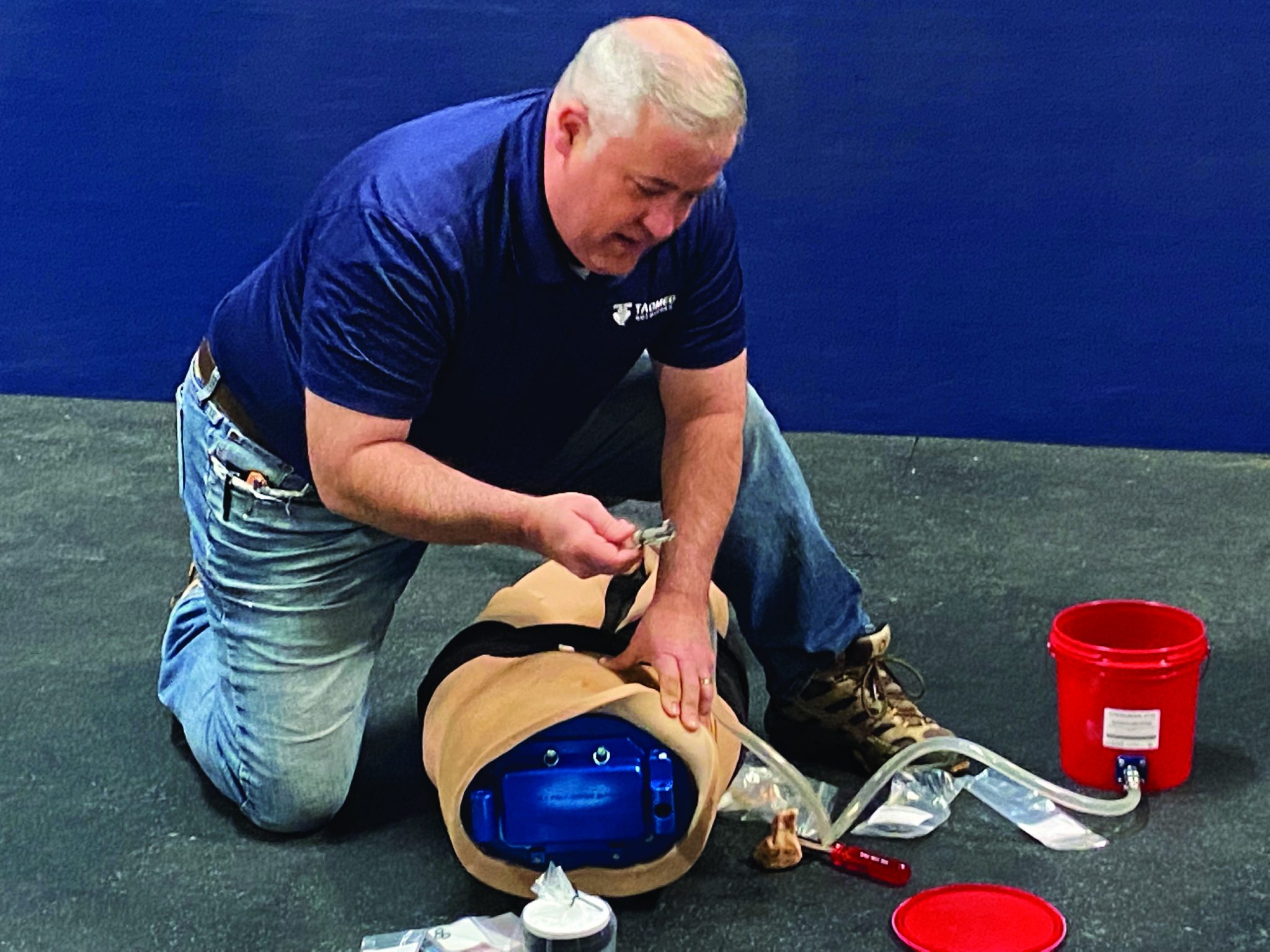 Paramedic Lt. Dan Stout Gainsville Police ret fills robot with b ...