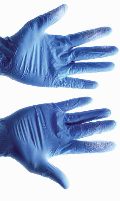 gloved hands with white powder - Police Chief Magazine