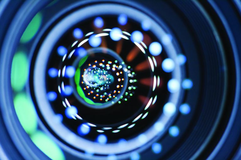 Blue, white, and green Light reflection in lenses of a lens - Police ...